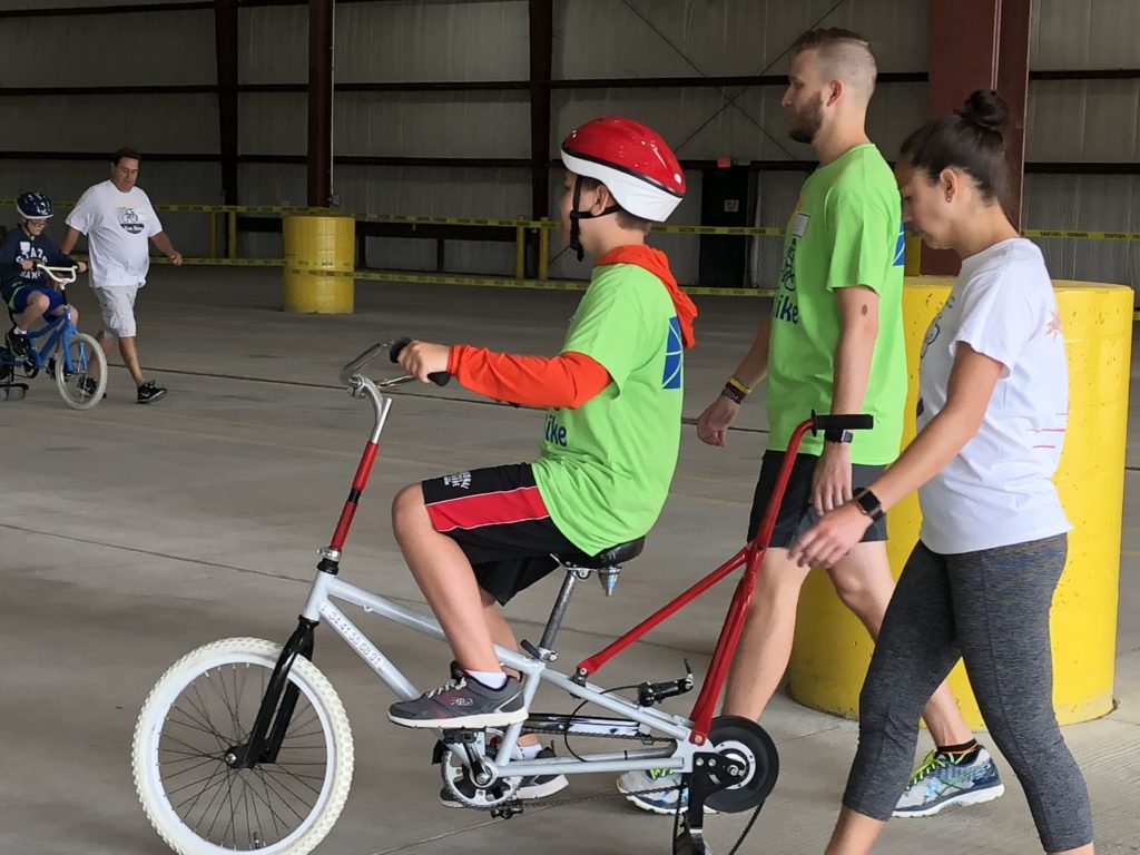 VanDerGinst Law Donates Helmets to iCan Shine Bike Camp